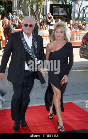 Tom Berenger and his wife Laura Moretti pose together at the premiere of a 4K restoration of the ...