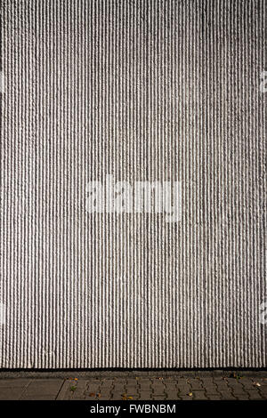 Grigio intonaco rigato street texture a parete Foto stock - Alamy