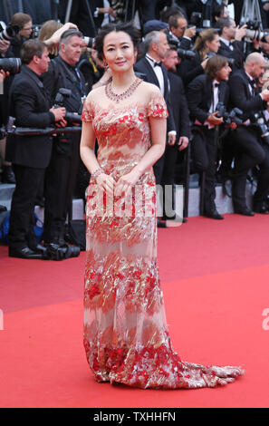 In this May 2, 2016 photo, Zhao Shunli puts on his uniform in his home ...