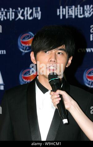 Taiwanese pop star Jay Chou, left, and Anne Suzuki of Japan, a co-star ...